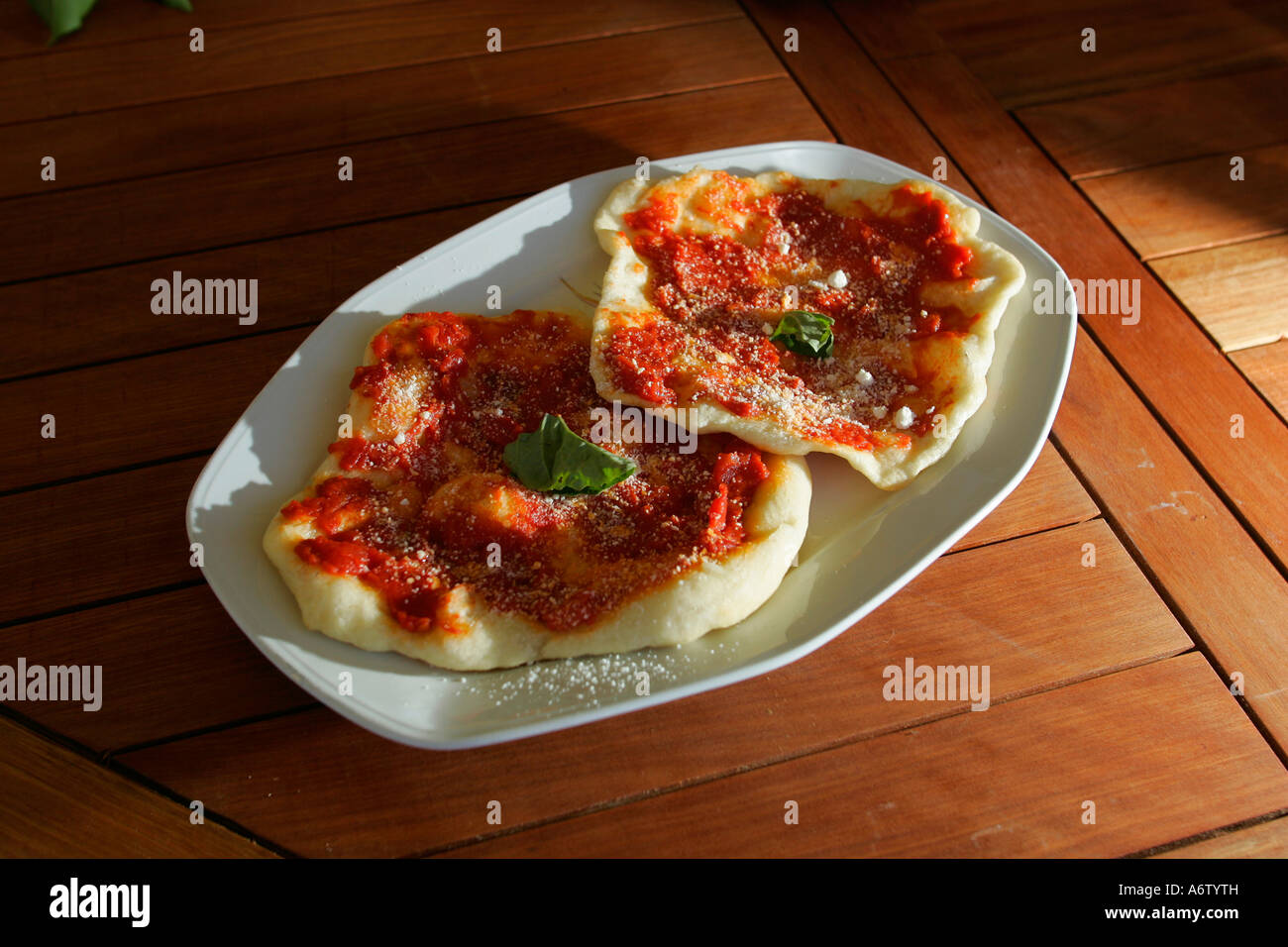 Small pizza slices Stock Photo - Alamy