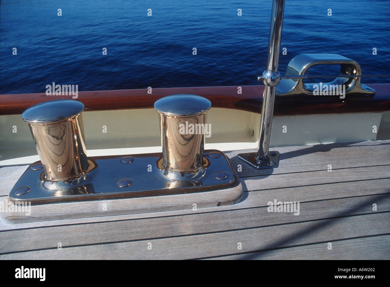 Brass ships bollard and fairlead Stock Photo - Alamy