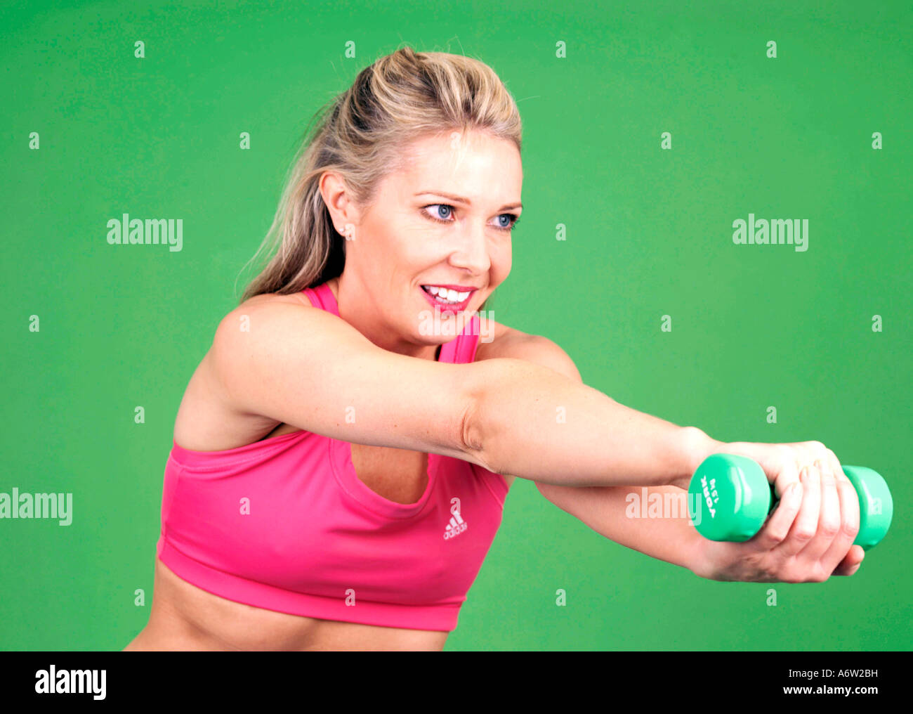 Woman Lifting Weights Model Released Stock Photo - Alamy