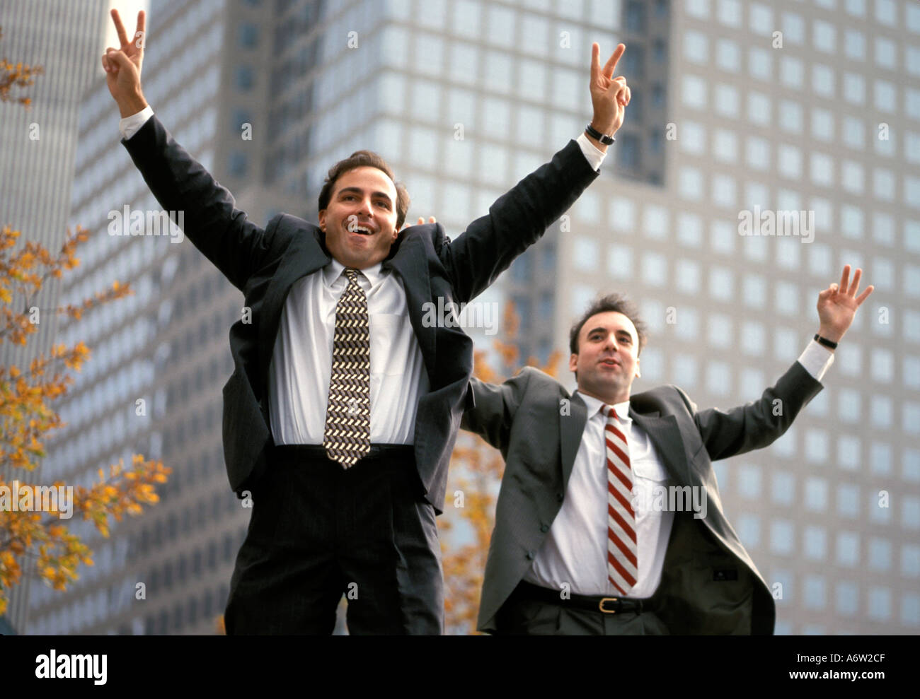 Businessmen Victory okay sign hand up Stock Photo - Alamy