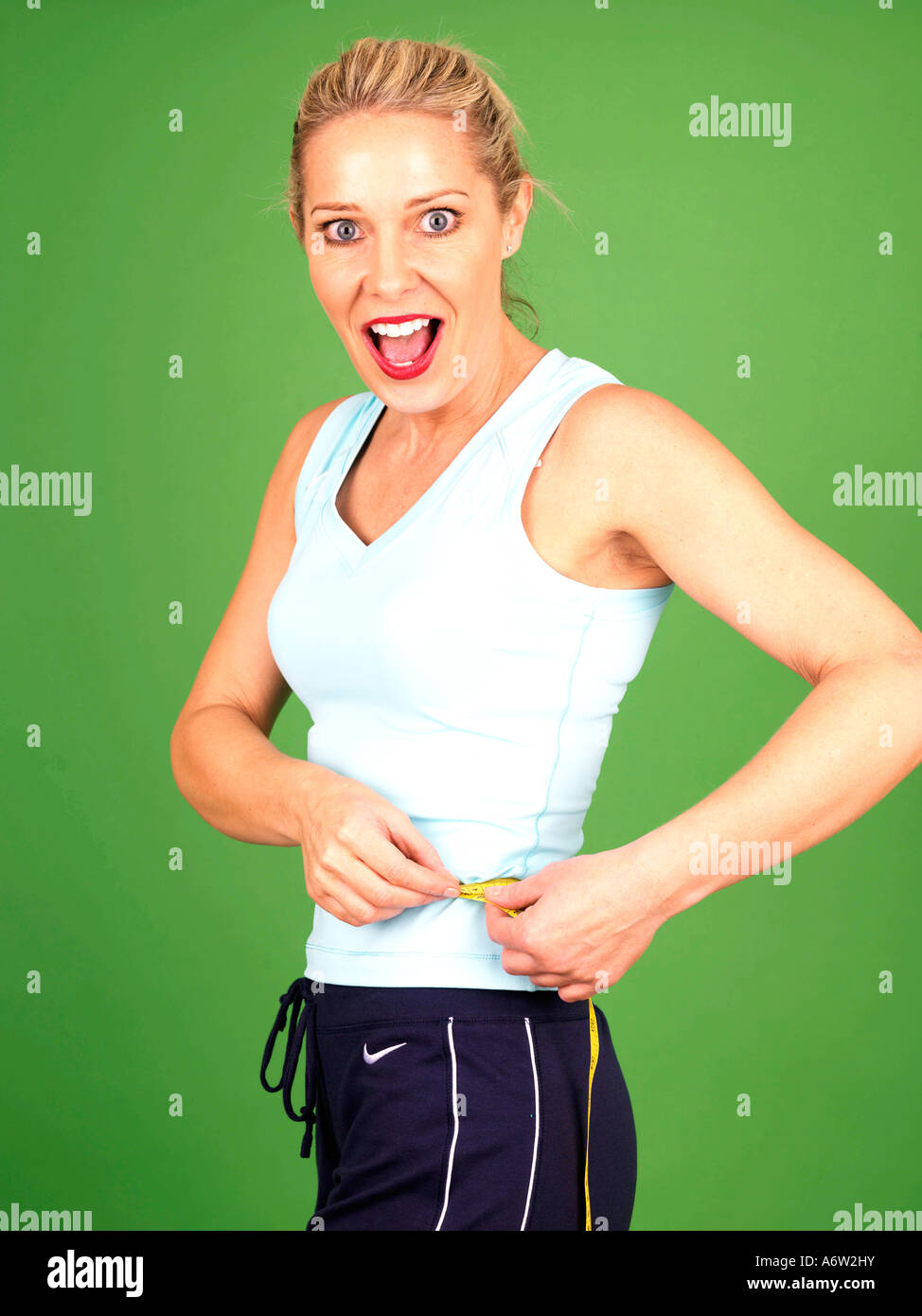 Woman Measuring Waist Model Released Stock Photo - Alamy