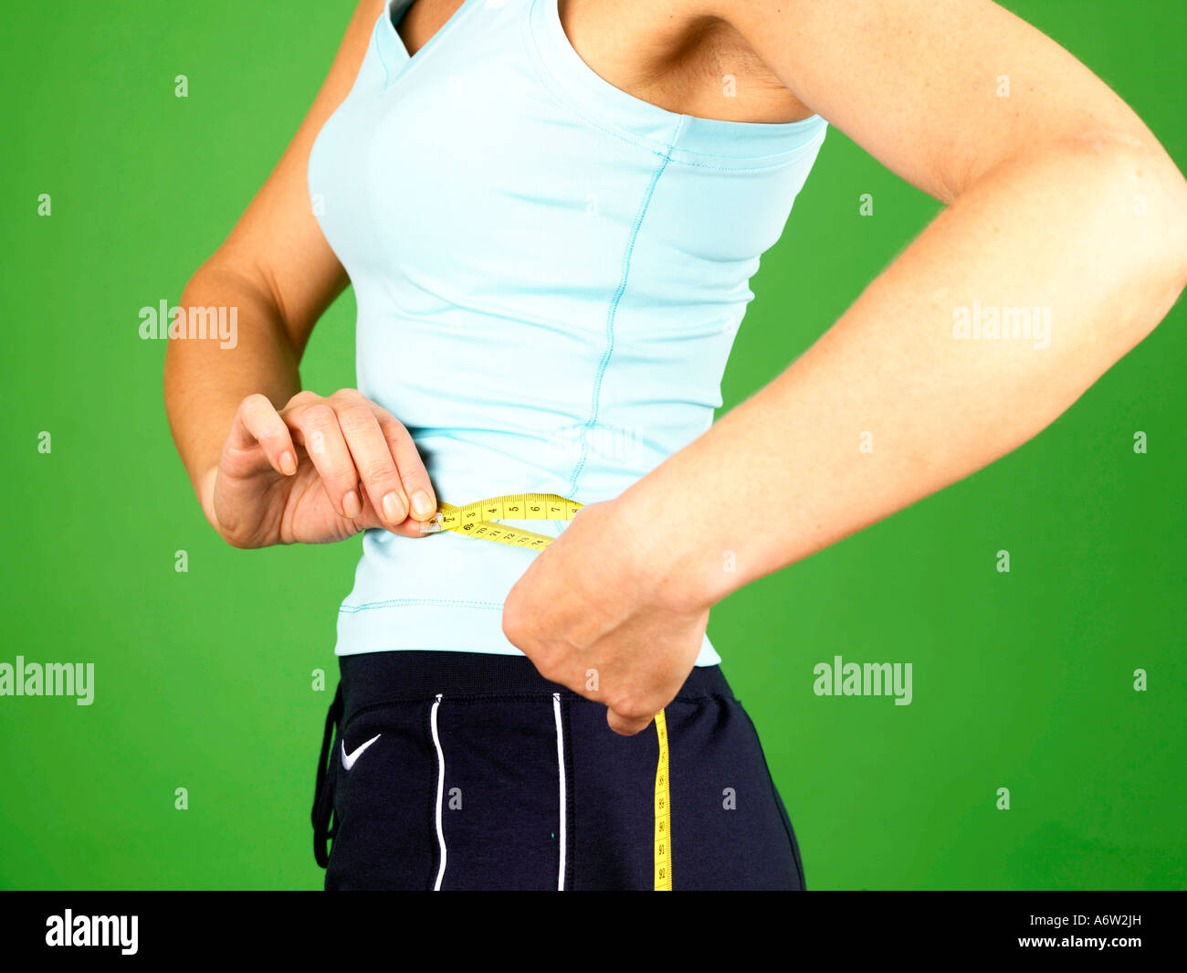 Woman Measuring Waist Model Released Stock Photo - Alamy