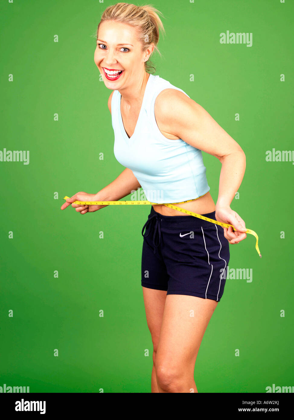 Woman Measuring Waist Model Released Stock Photo - Alamy