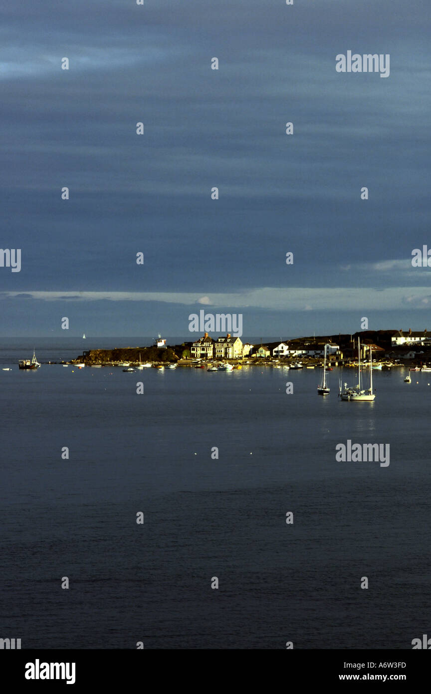 Peveril Point and harbour at Swanage at dusk White buildings picked out ...