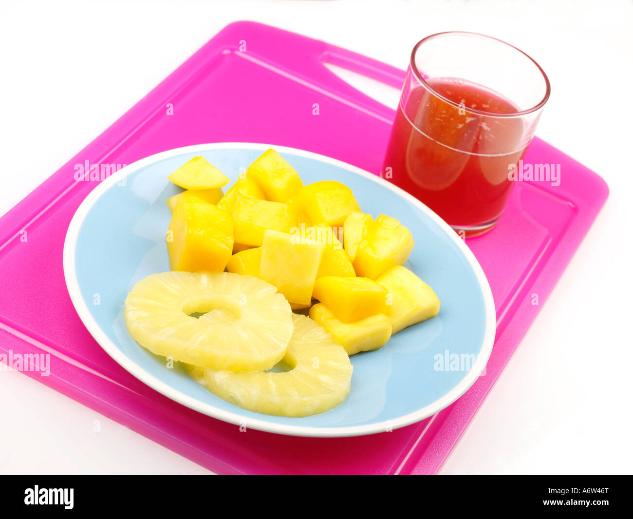 Mango and Pineapple with Fruit Juice Stock Photo - Alamy