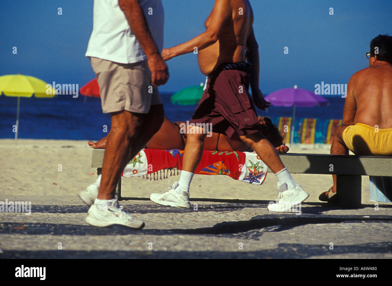50 years old sedentary men walk at Copacabana beach Rio de Janeiro ...