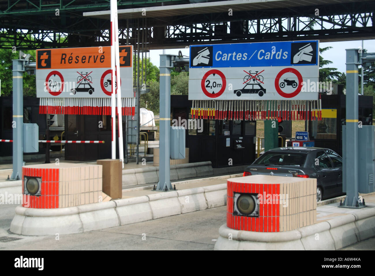 French motorway toll booths with car Stock Photo - Alamy