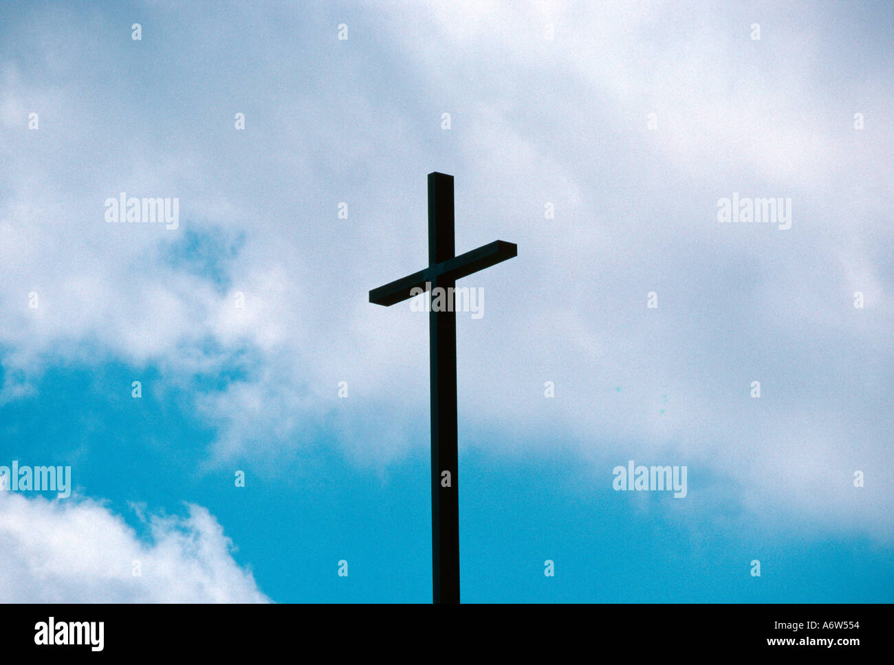 Jesus cross against heavenly blue hi-res stock photography and images ...