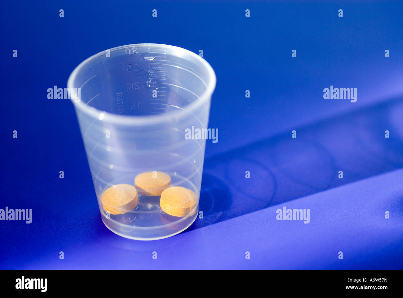 Three medication pill in a cap Stock Photo - Alamy