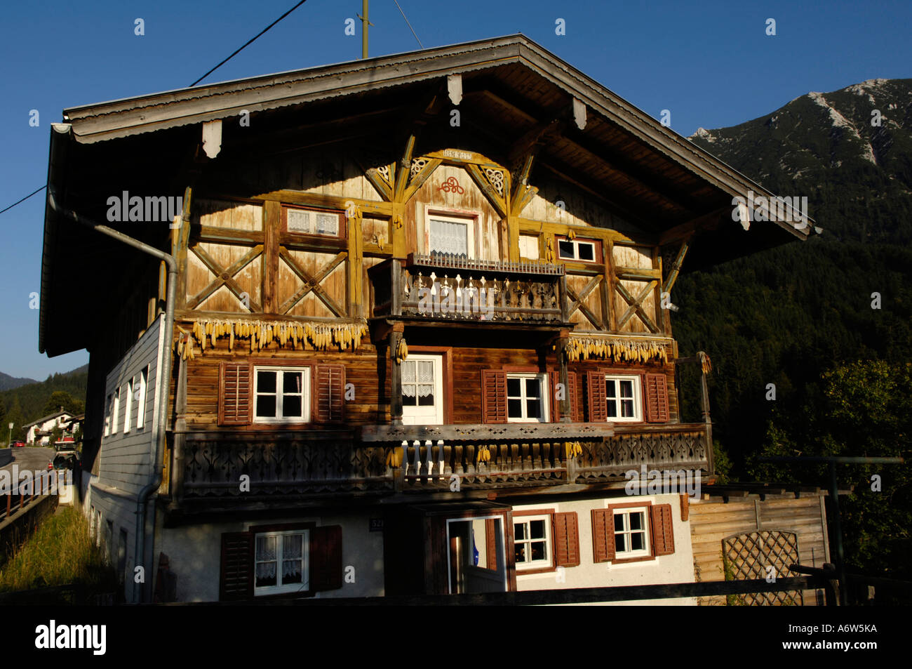 traditional farmhouse with corn drying on the facade Stock Photo - Alamy