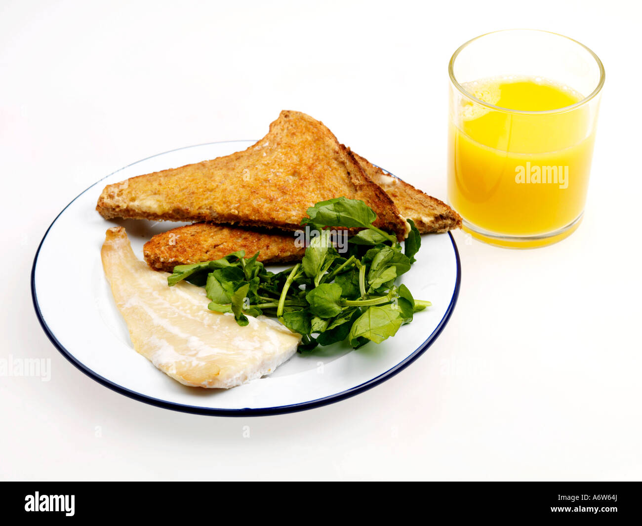 Poached Haddock Fillet Stock Photo - Alamy