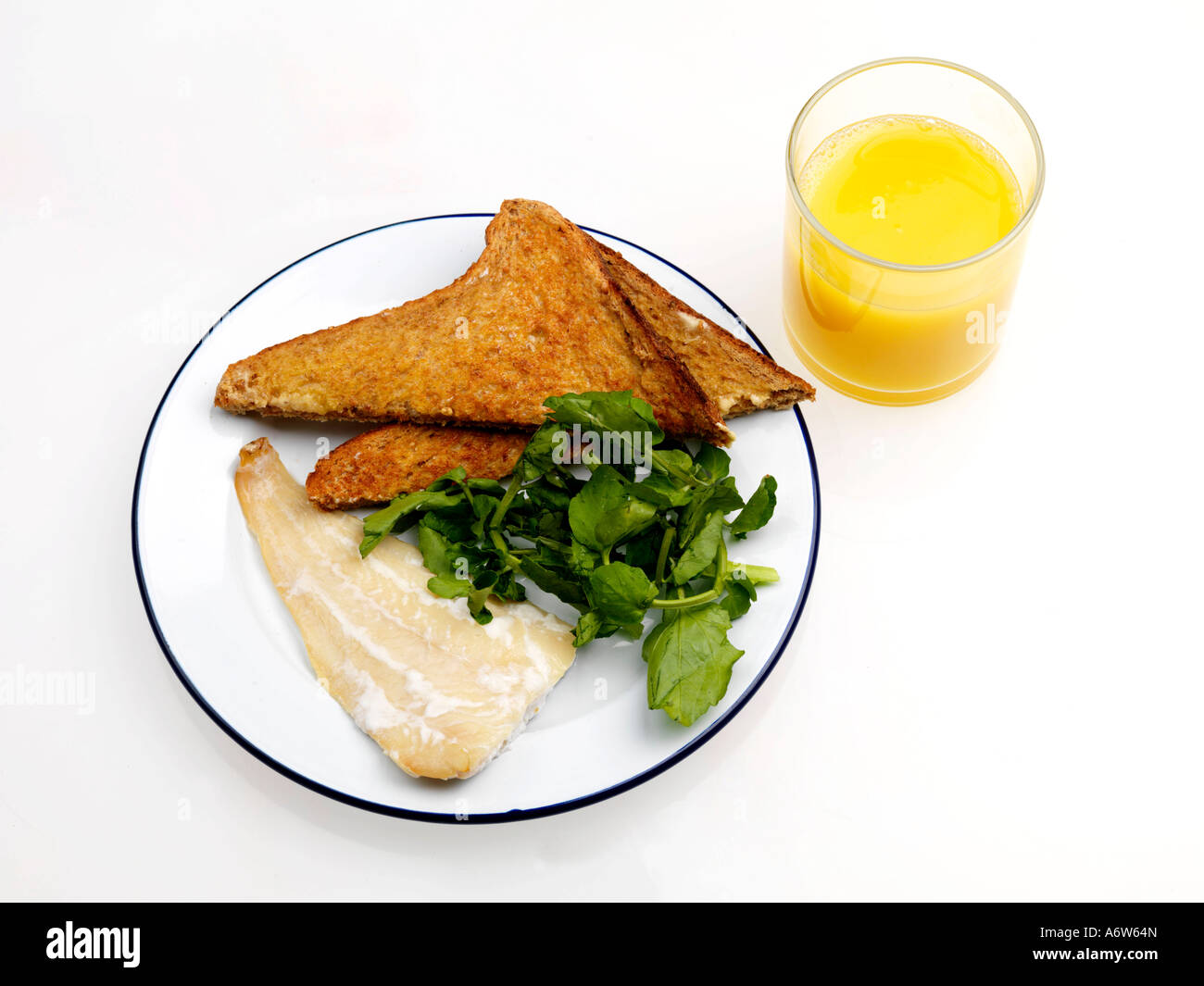 Poached Haddock Fillet Stock Photo - Alamy