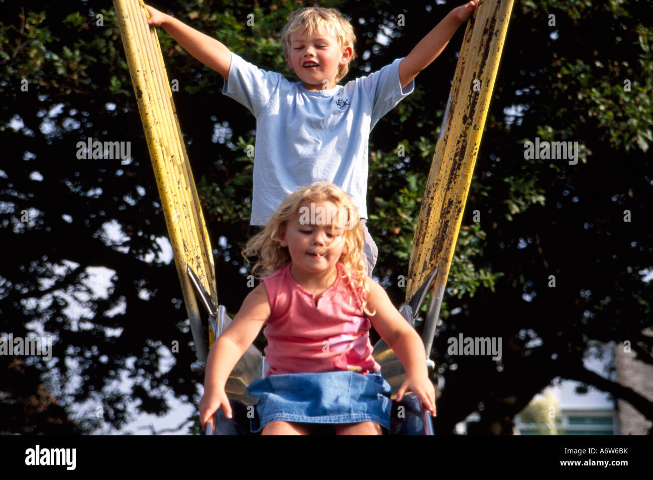 Children Using Slide Models Released Stock Photo - Alamy