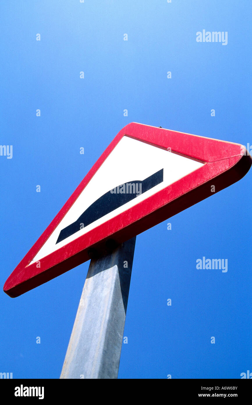 European road sign signs speed bump bumps warning motoring hi-res stock ...