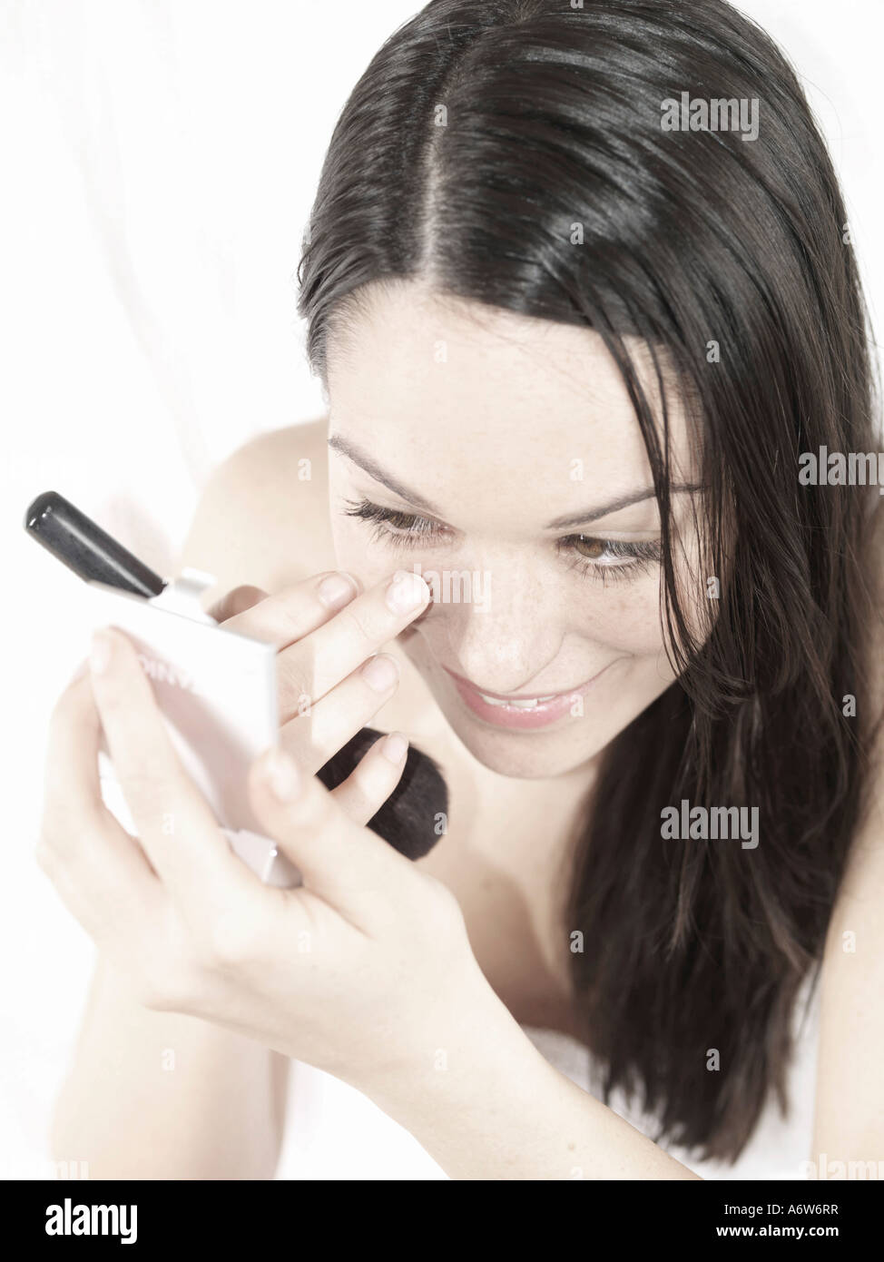Young Woman Applying Face Powder Model Released Stock Photo - Alamy