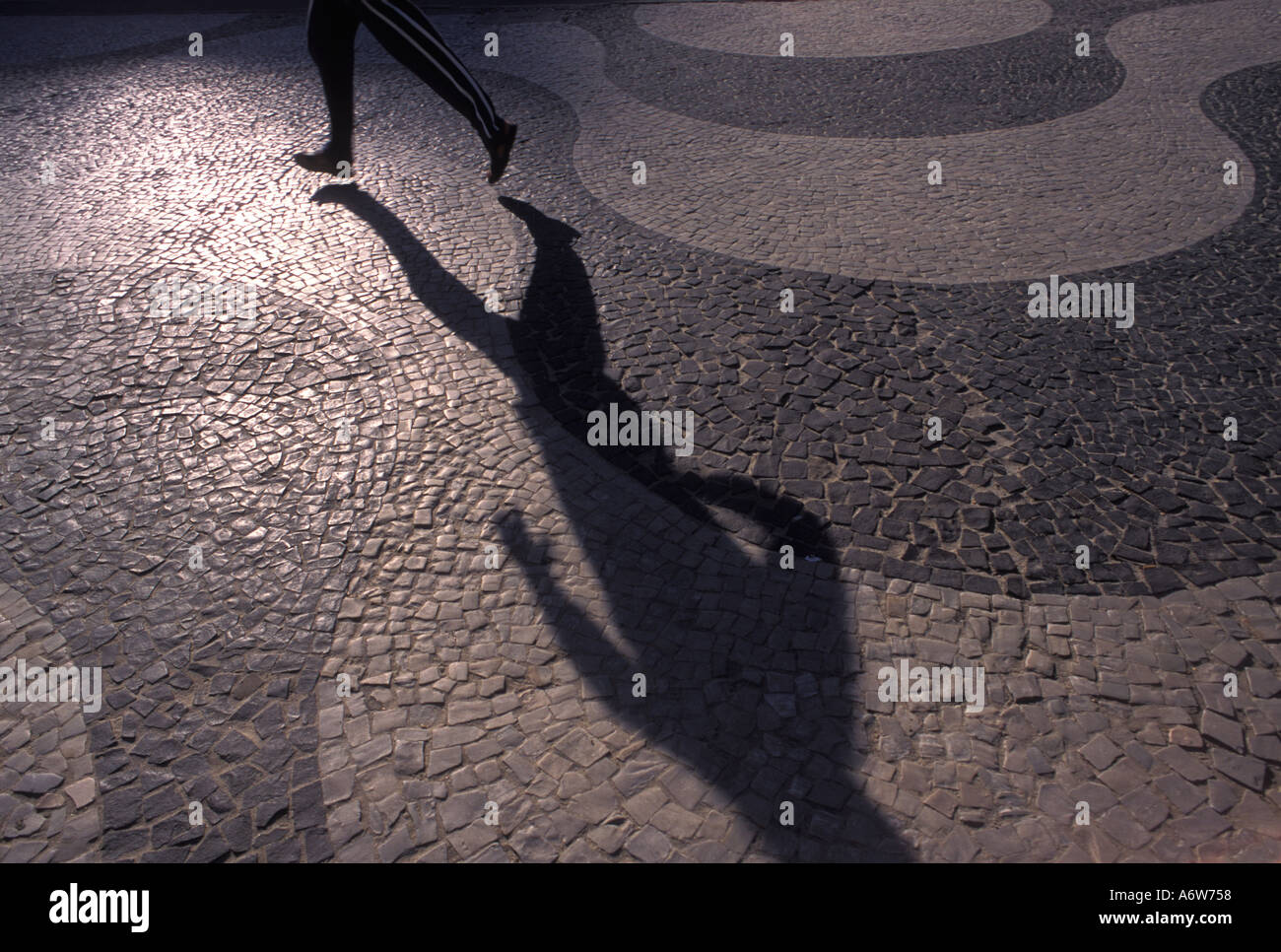 Runner Copacabana beach pedestrian walkway Rio de Janeiro Brazil ...
