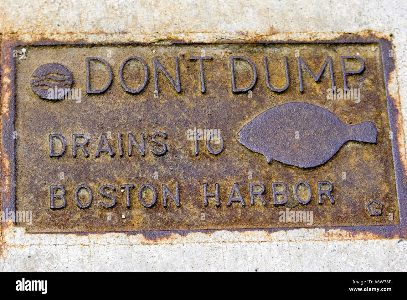 rusty DON T DUMP Drains to Boston Harbor plaque on Boston sidewalk ...