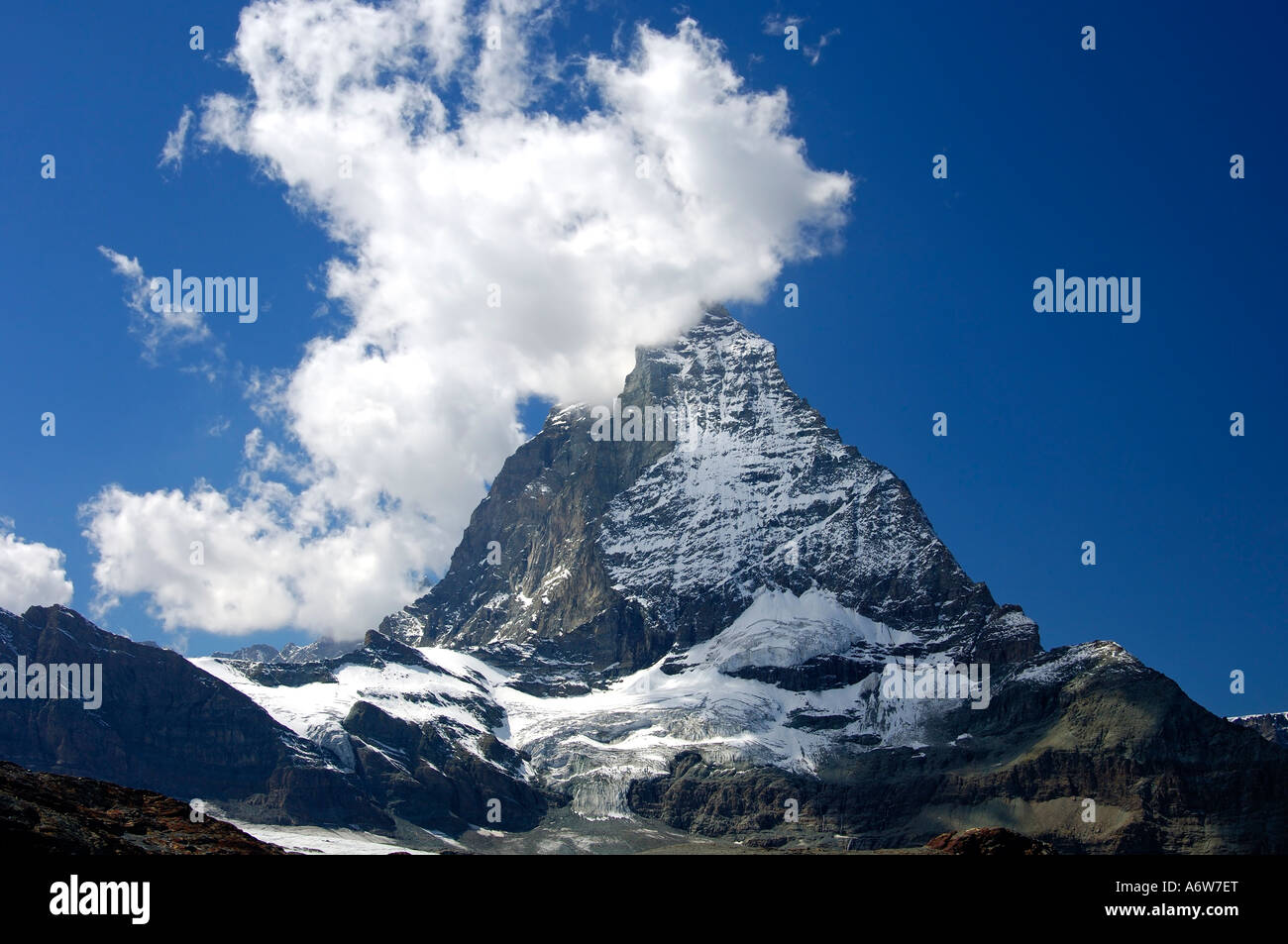 Clouds crowning Mount Matterhorn, Hoernli ridge, Zermatt Valais ...
