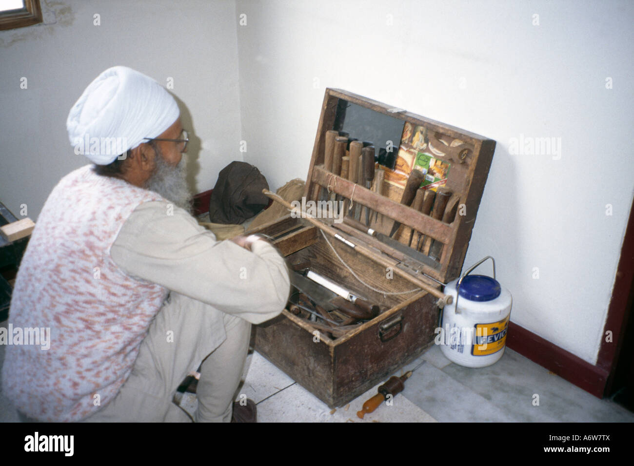 Amritsar India Sikh Carpenter With Pictures Of Gurus In Tool Box Stock ...
