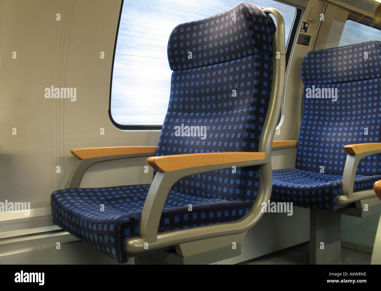 Empty passenger train seat Stock Photo - Alamy