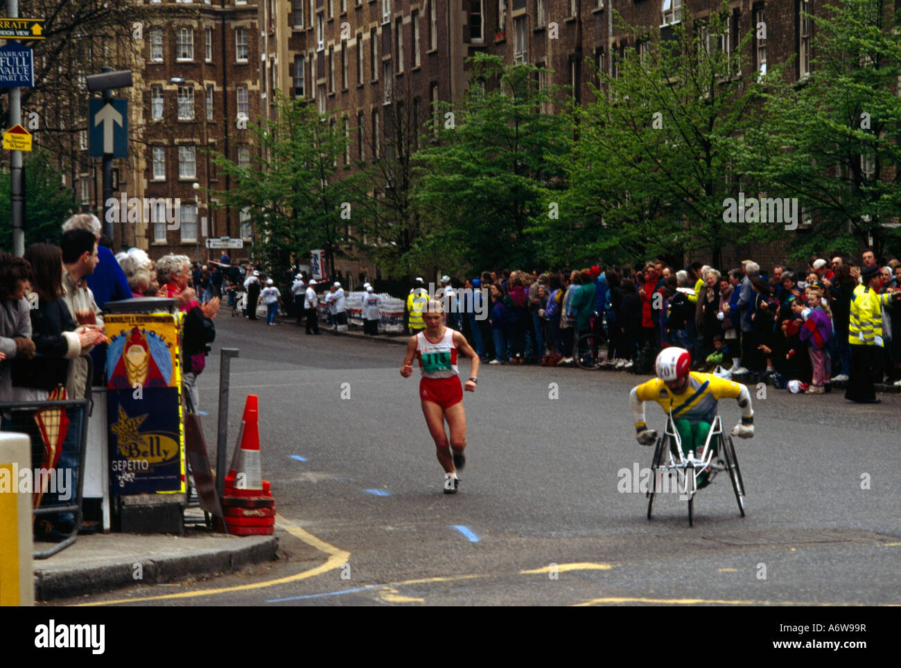 Female Runner and Wheelchair Racer London Marathon England Stock Photo ...