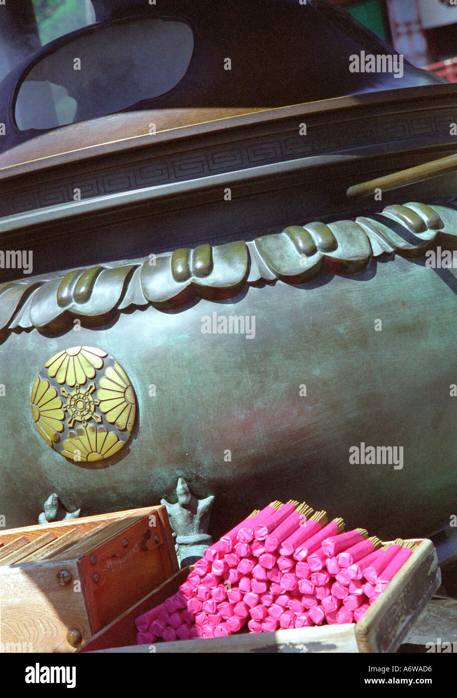 Sticks of incense in front of a temple cauldron Kyoto Japan Stock Photo ...