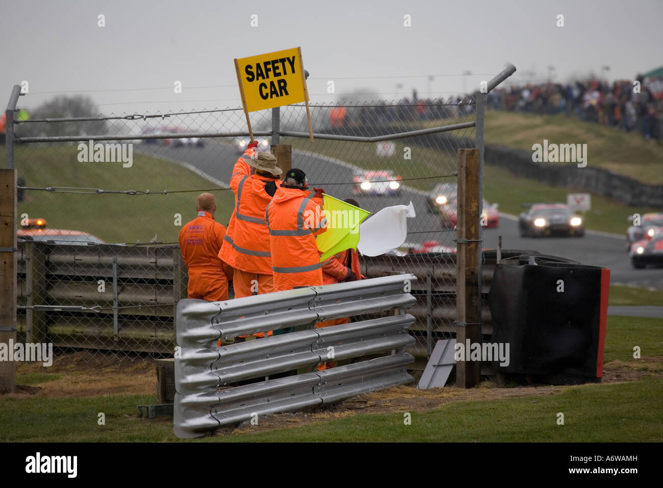 Safety crew displaying the safety car flag at Oulton Park GT Racing ...