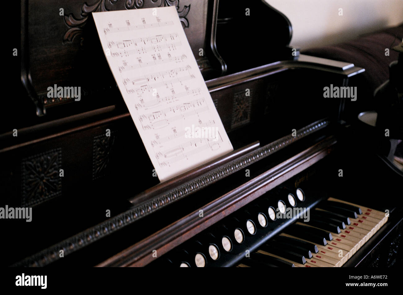 old antique pump organ circa 1600 with sheet music Stock Photo - Alamy
