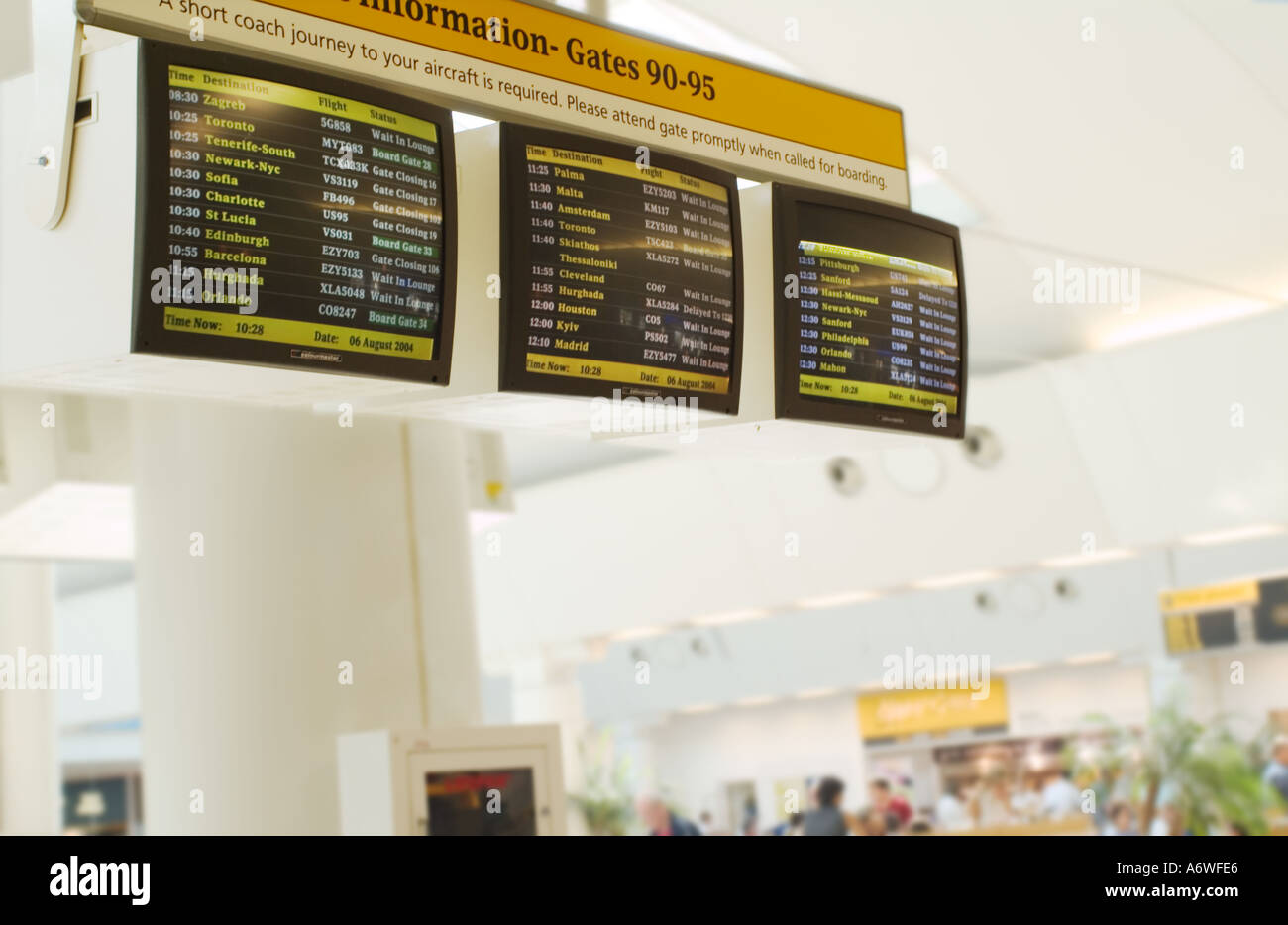 Airport flight information boards Stock Photo - Alamy
