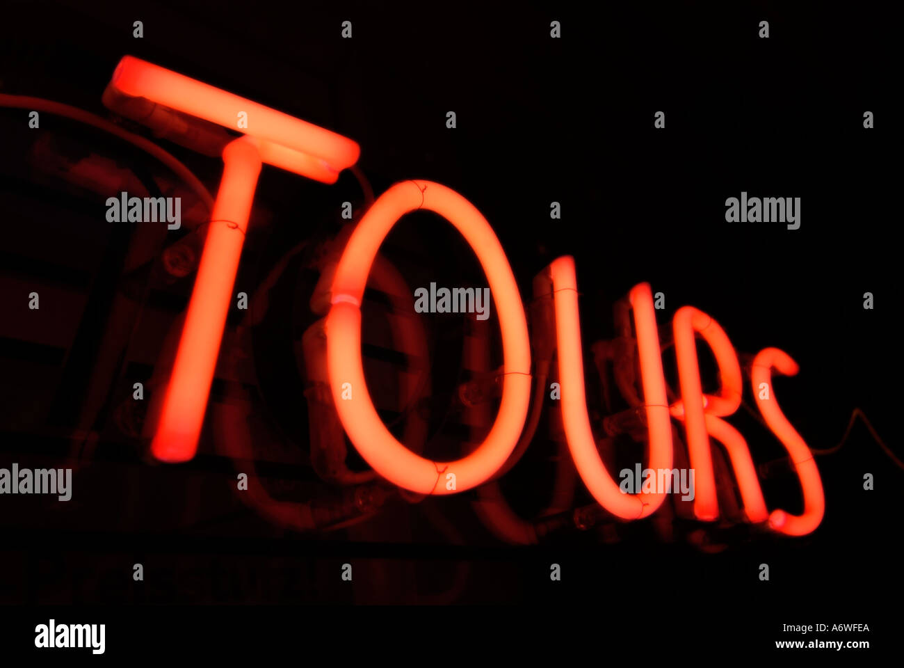Tours red pink neon sign at night Stock Photo - Alamy