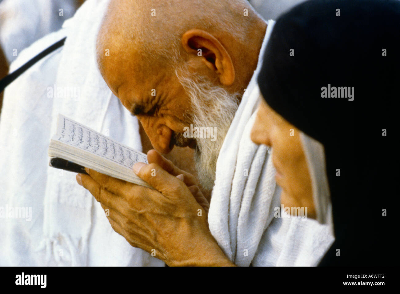 Makkah Saudi Arabia Hajj Pilgrims Man Reading Quran Stock Photo - Alamy