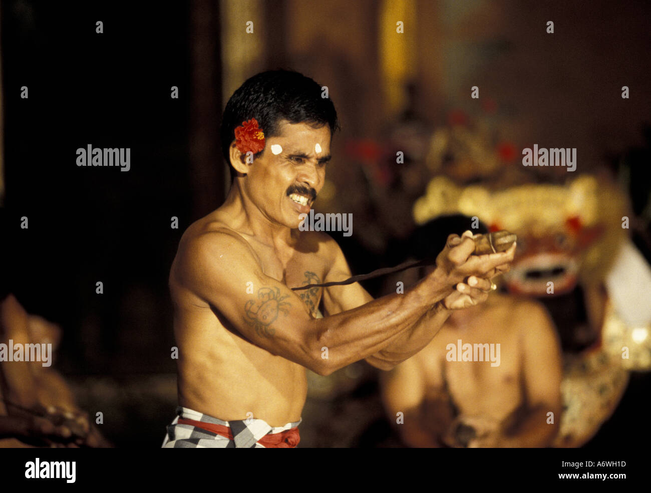 Asia, Indonesia, Bali, Ubud. Dancer thrusts knife into chest during ...