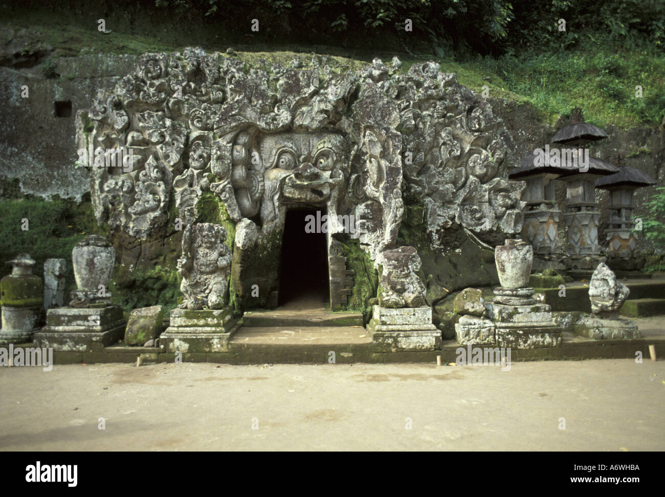 Asia, Indonesia, Bali. Balinese temple carved into stone wall Stock ...