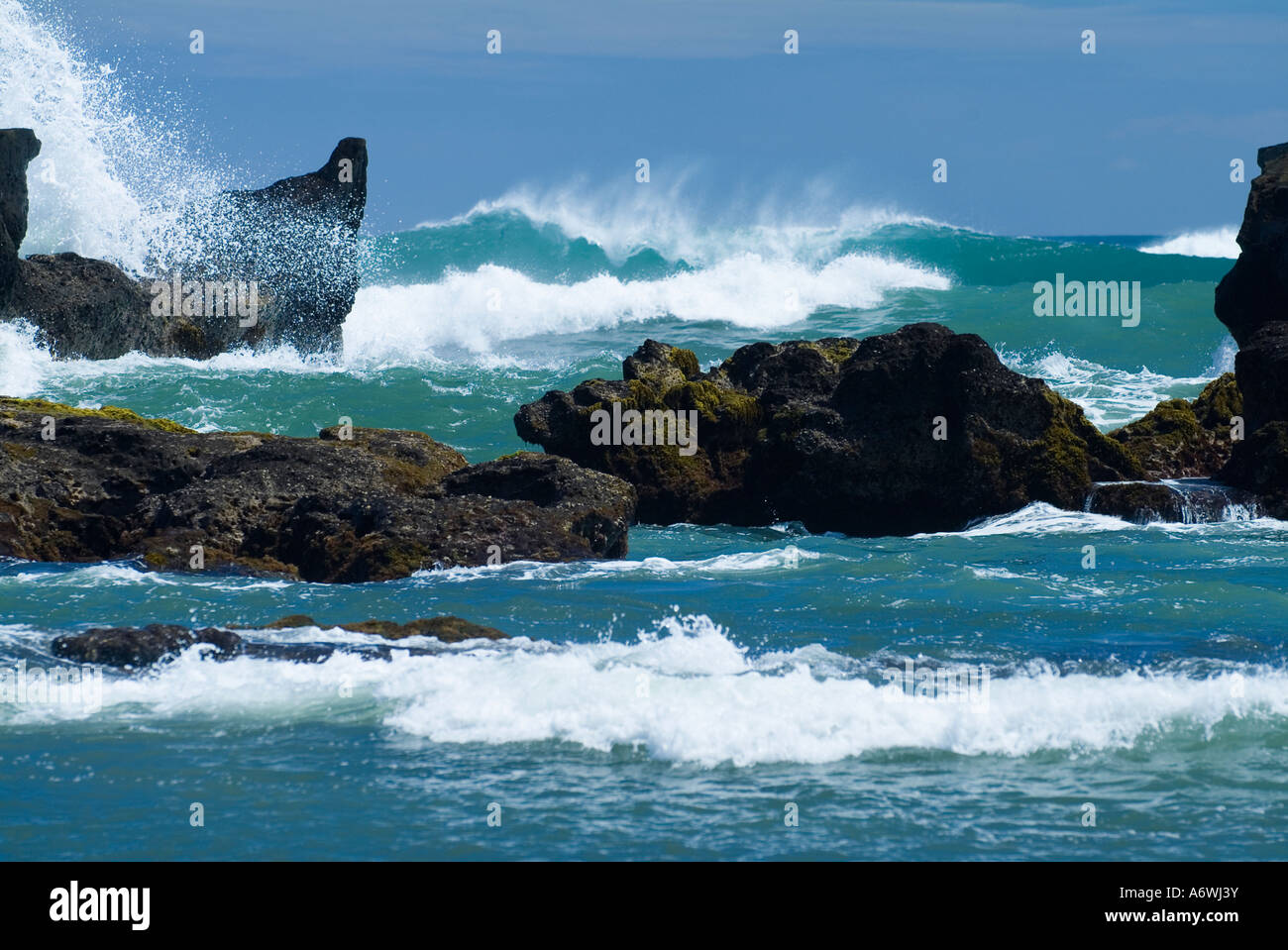 big waves pounding rocks Stock Photo - Alamy