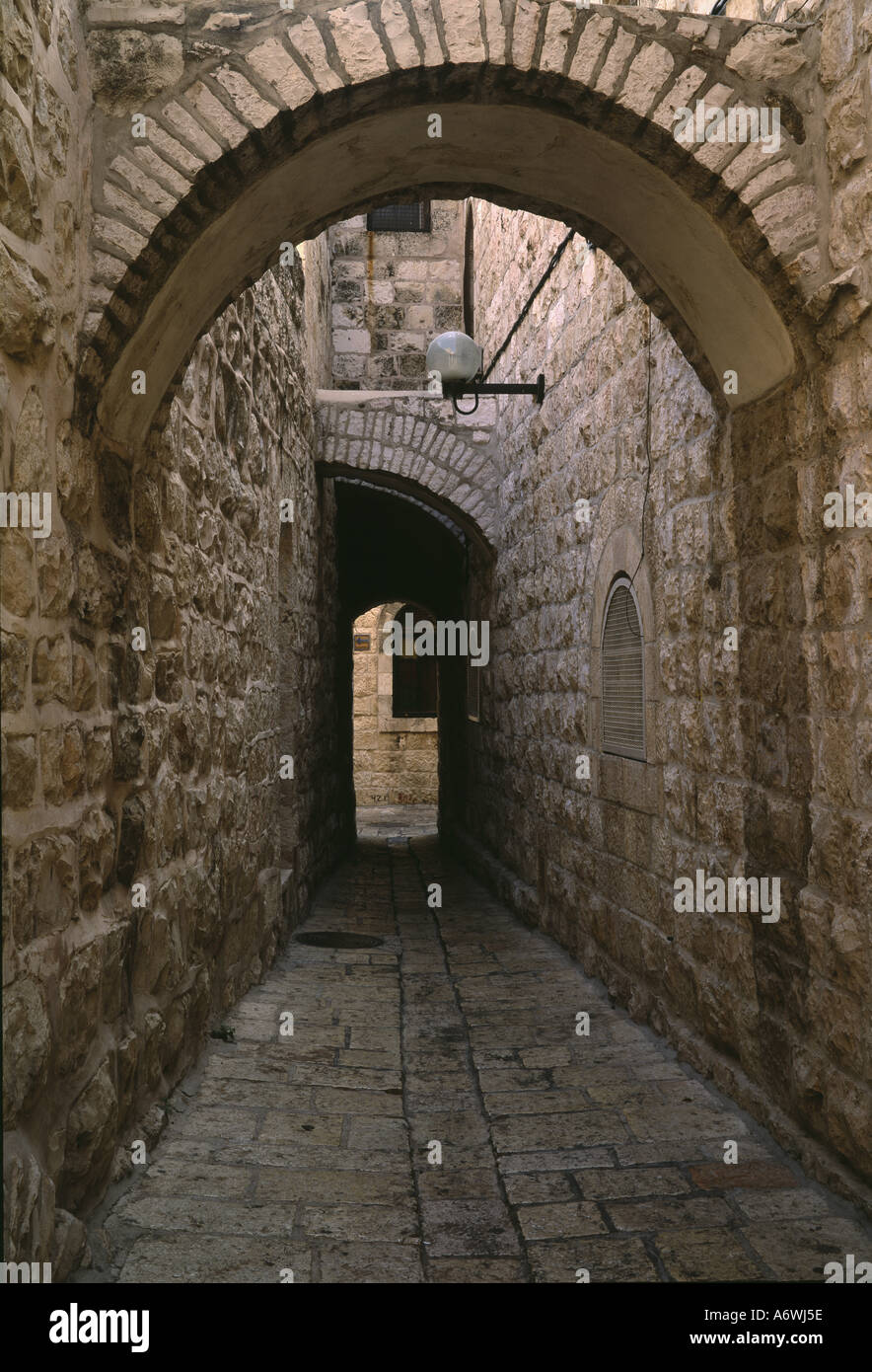 Israel, Jerusalem, Old City , arch of Jerusalem stone and narrow lane ...