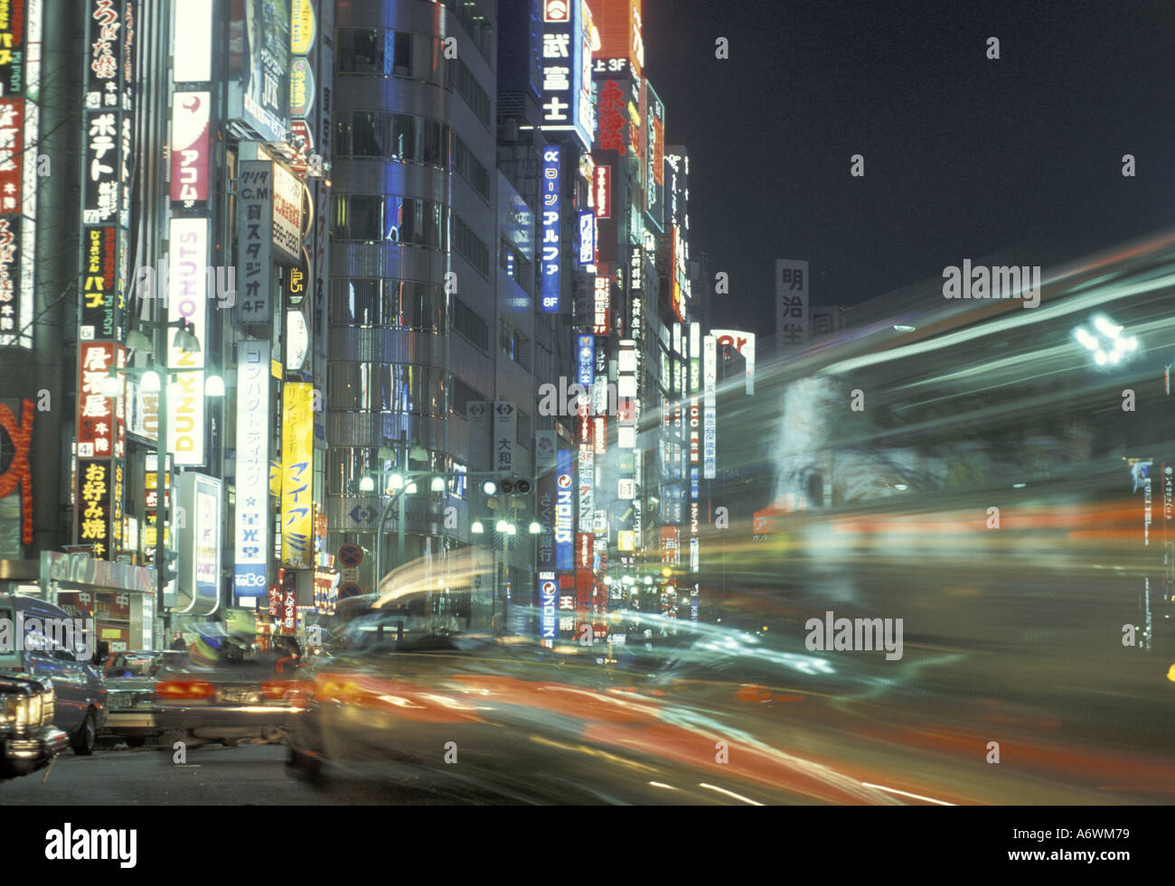 Asia, Japan, Tokyo, Shinjuku, Buildings, neon lights, and car lights ...