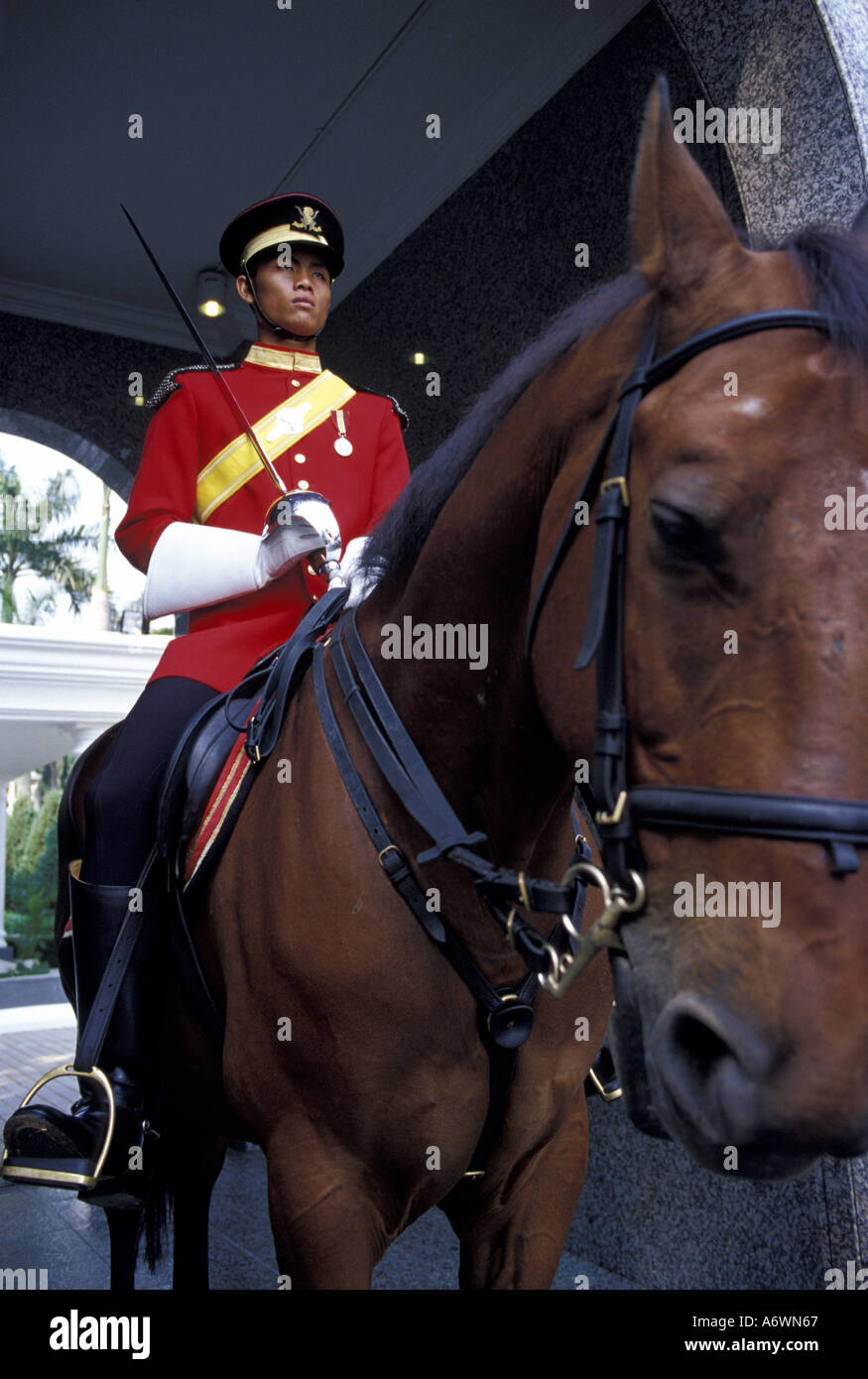Malaysia, Malaya, Kuala Lumpur. Mounted guard at the Royal Palace Stock ...