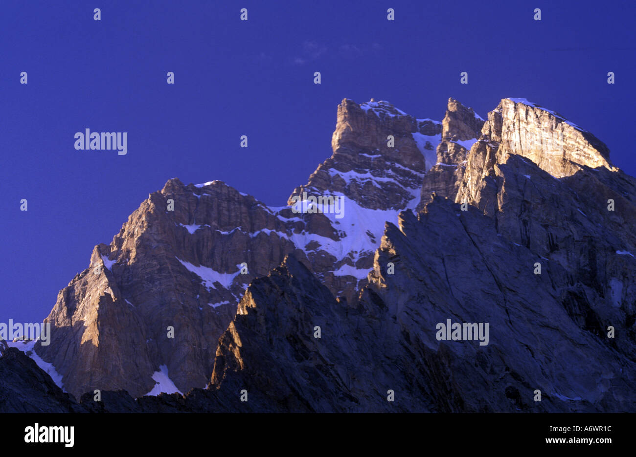 Pakistan, Baltoro Muztagh Range. Sunrise on the mountain range Stock ...