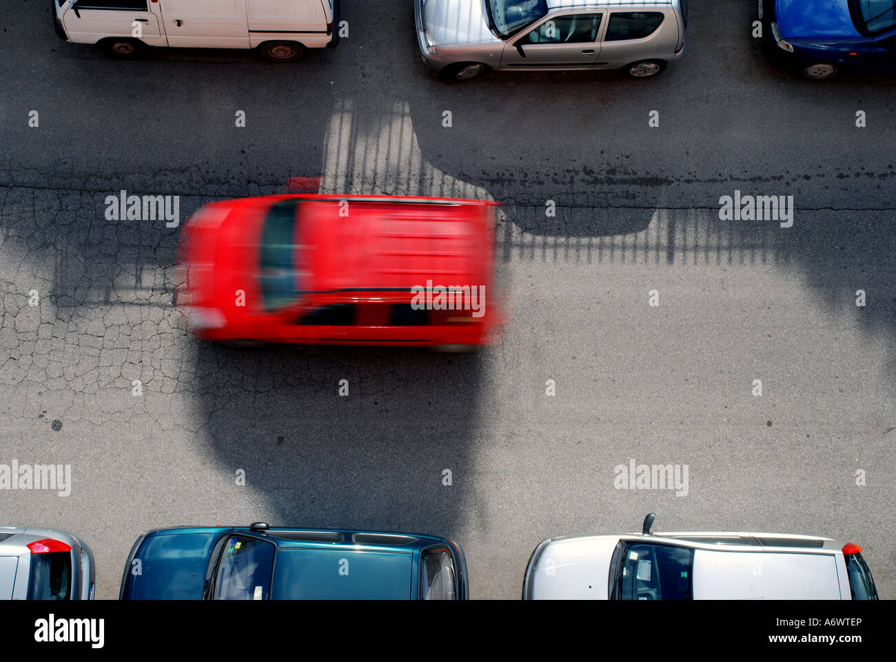 Red car running in Rome red street trafic cars road Stock Photo - Alamy