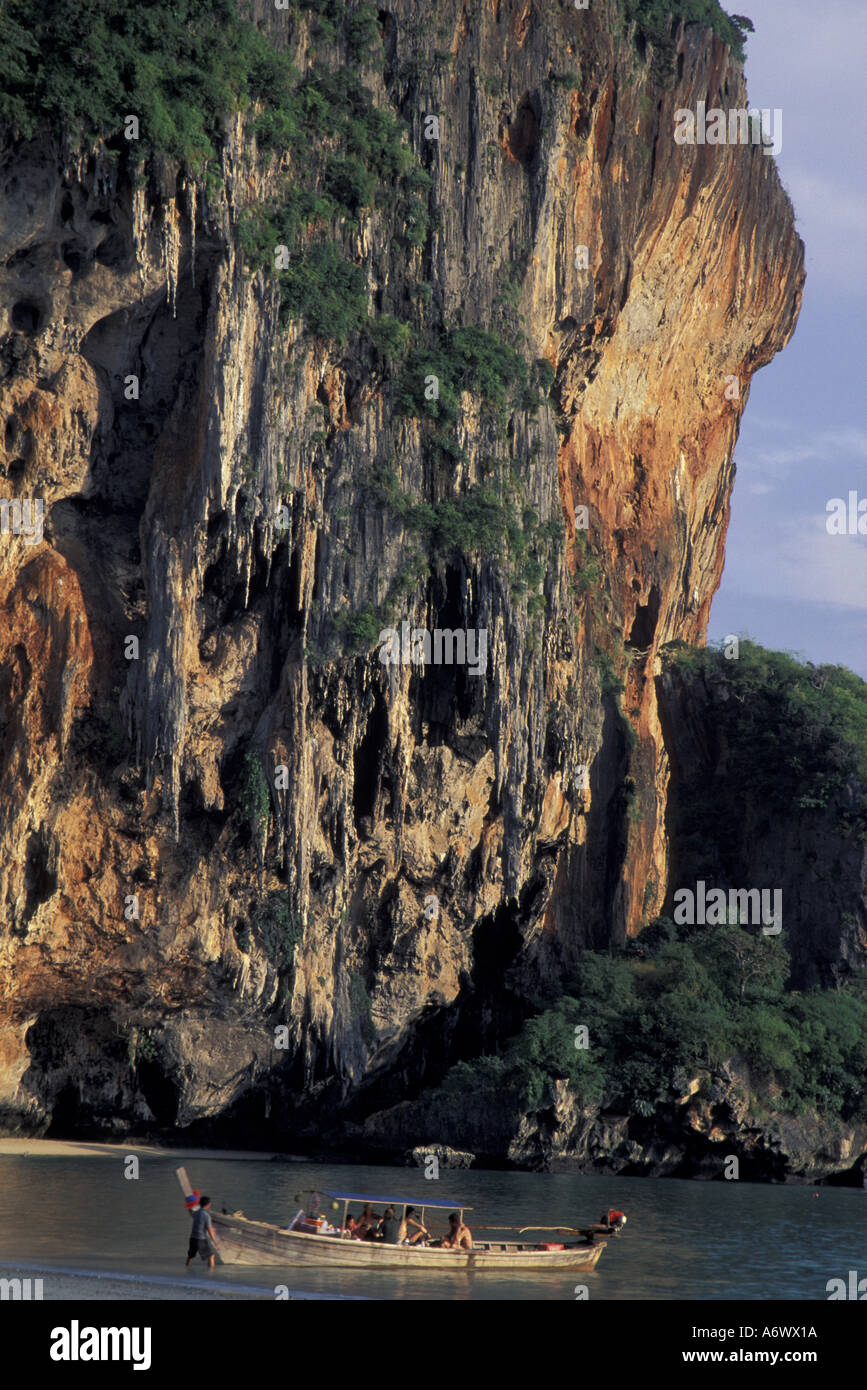 Thailand, near Krabi, Hat Tham Phra Nang Beach, Long-tailed boat below ...