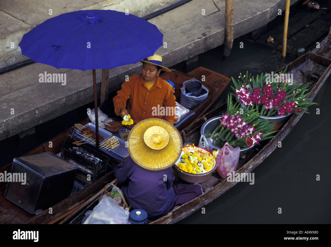 Flower vendor floating flower market hi-res stock photography and ...