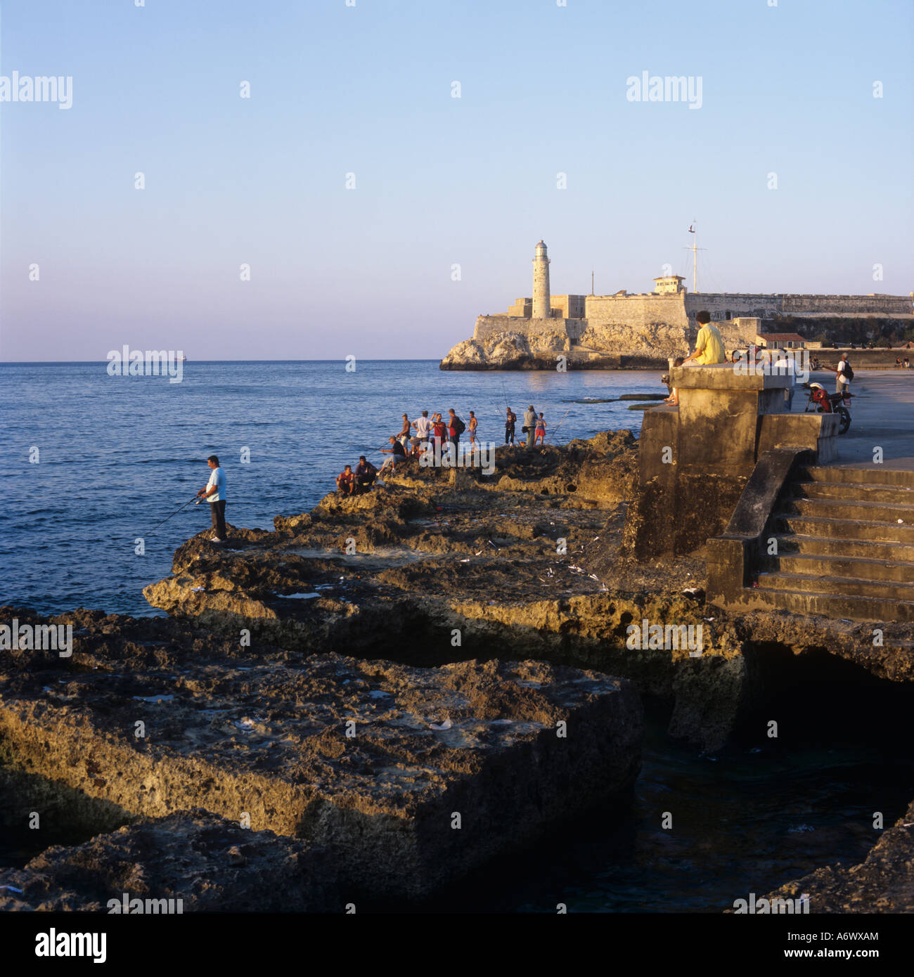 Fishermans on the waterfront in Havana, Cuba Stock Photo - Alamy