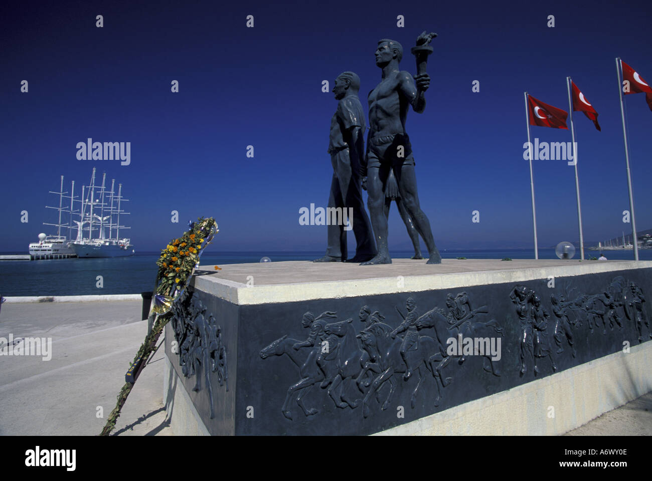 Europe, Turkey, Kusadasi. Sports monument with cruise ship Stock Photo ...