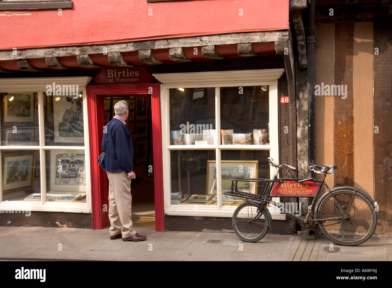 Shopfront and old bicycle, Street scene, Worcester, Worcestershire ...