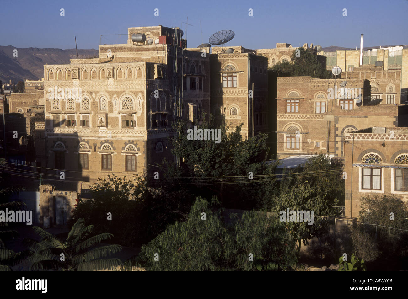 Yemen, Sana'a Yemeni houses in afternoon glow Stock Photo - Alamy