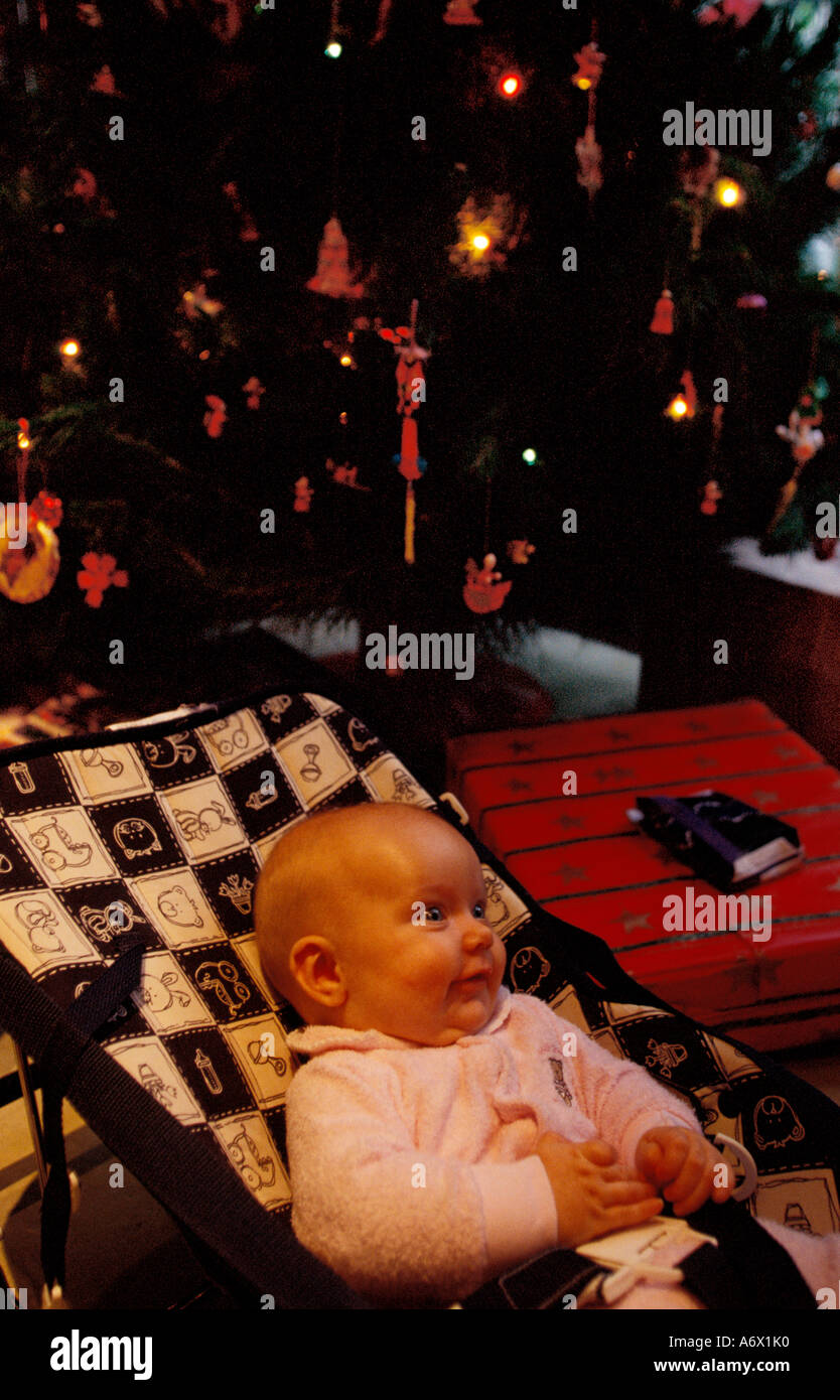 Baby under Christmas Tree Sydney Australia Stock Photo - Alamy