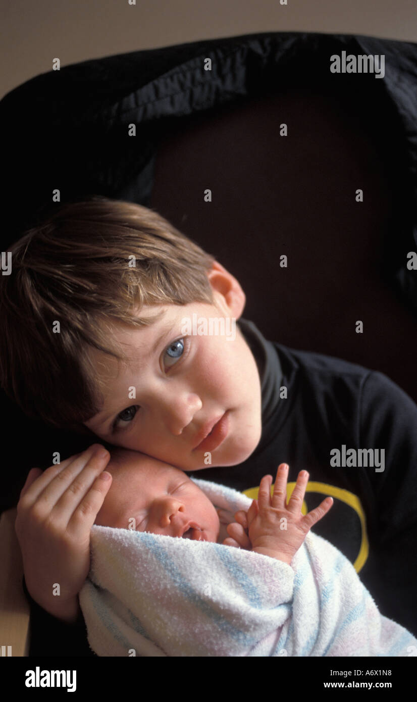 Brother and New Born Sister Australia Stock Photo - Alamy