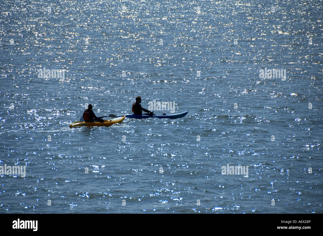 two people kayaking at sea Stock Photo - Alamy