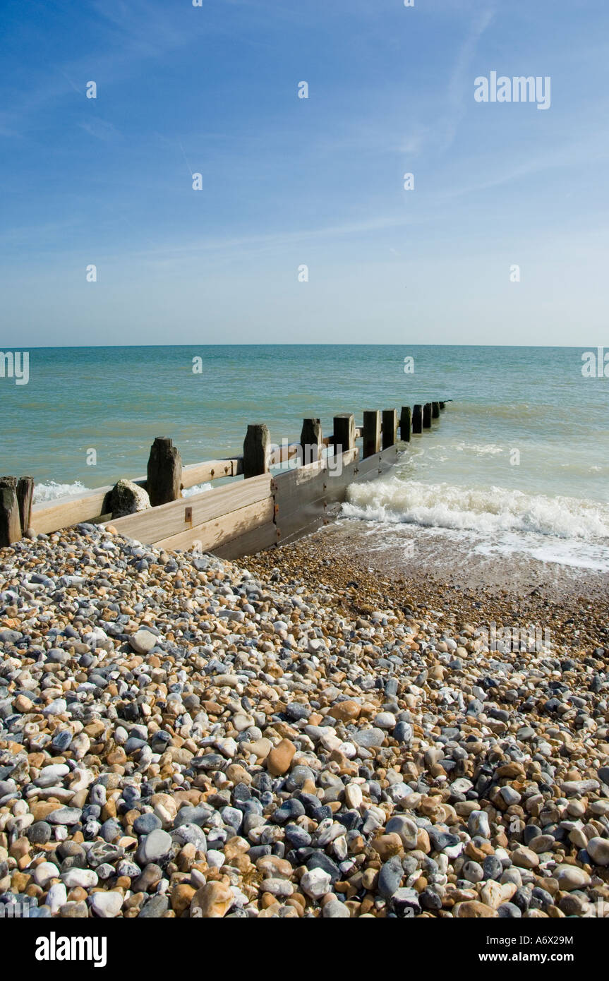 shingle beach and seashore with erosion protection groin Stock Photo ...
