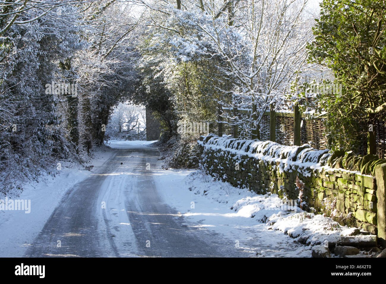 snow covered country lane Stock Photo - Alamy